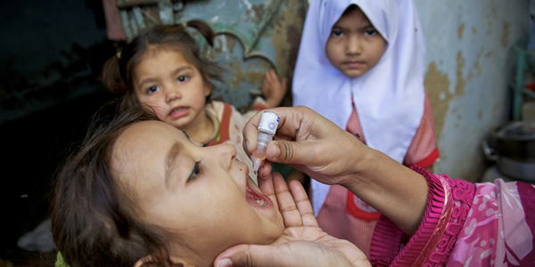 Response to a Large Polio Outbreak in a Setting of Conflict — Middle ...